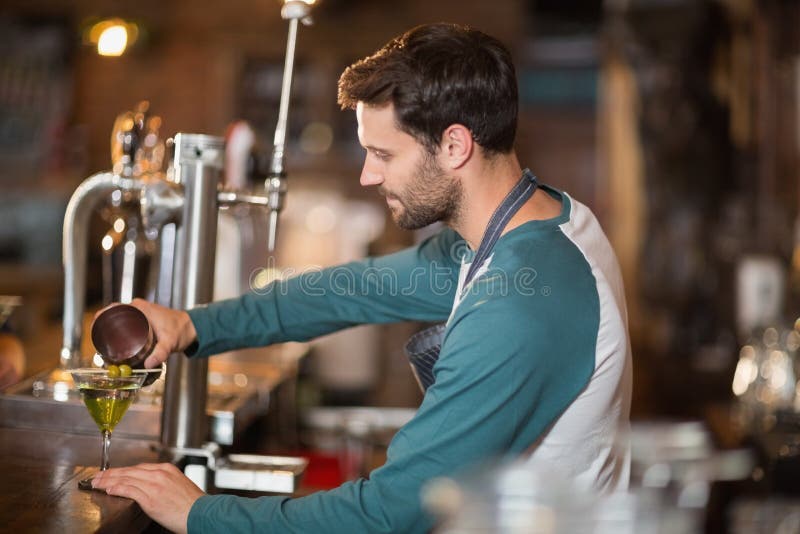 Side View of Bartender Making Drinks Stock Image - Image of standing ...