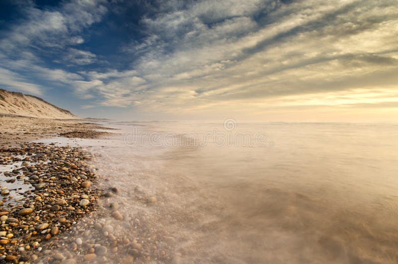 Side View of this Beach Full of Pebbles in the Coastline Stock Photo ...