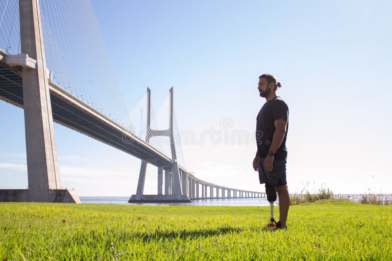Side View of Bearded Man with Amputated Leg Enjoying Summer Day Stock ... Side View of Bearded Man with Amputated Leg Enjoying Summer Day Stock ...