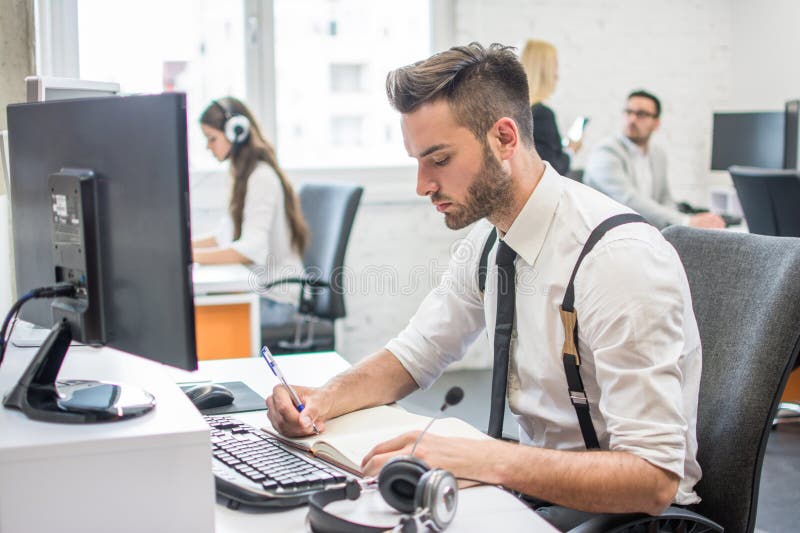 Side View of Beautiful Handsome Young Man Working in Office. Stock ...