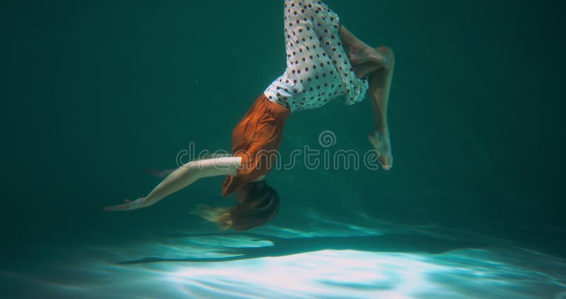 Atmospheric Cinematic Side Shot of Young Beautiful Dancer Woman Doing ...