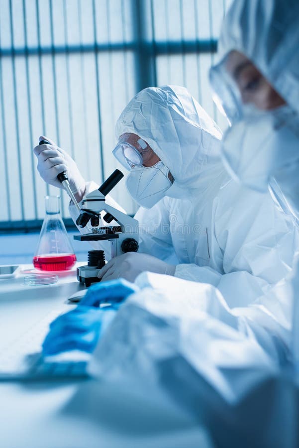 Side View of Bioengineer in Hazmat Stock Image - Image of biohazard ...