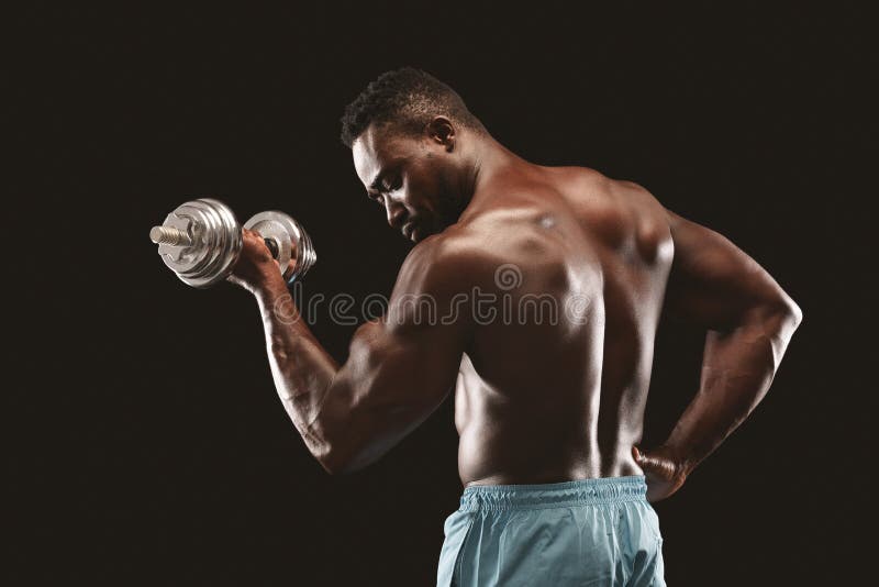 Side View of Black Bodybuilder Doing Single Arm Dumbbell Curl Stock ...
