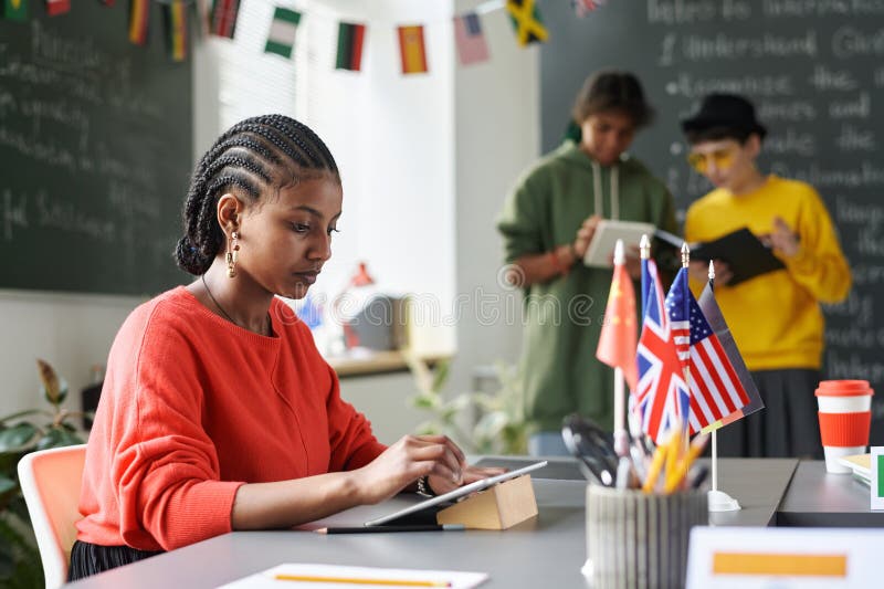 Side View of Black Female Student Using Tablet Stock Photo - Image of ...