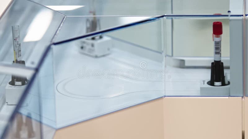 Side View of Blood Samples Moving on a Laboratory S Belt Conveyor ...