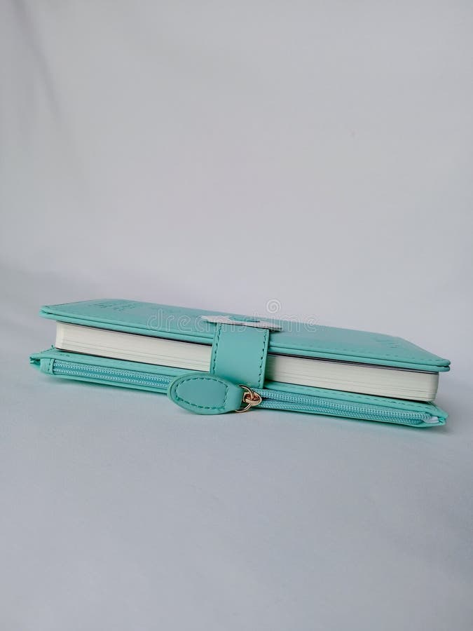 Side View of a Blue-green Diary on White Background Stock Photo - Image ...