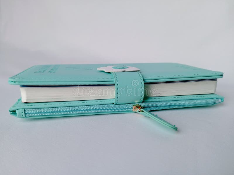 Side View of a Blue-green Diary on White Background Stock Image - Image ...