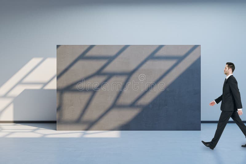 Side View of Blurry Man Walking in Spacious Gallery Interior with Empty ...