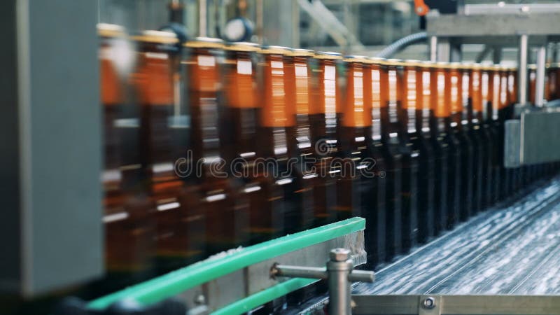 Bottled Lager Beer Pouring Vessel Closeup. Sparkling Cold Beverage ...