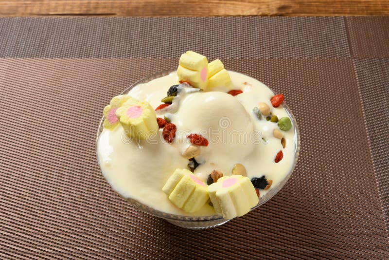 Melted Bowl Vanilla Flavor Ice Cream Sundae in a Melting Process with ...