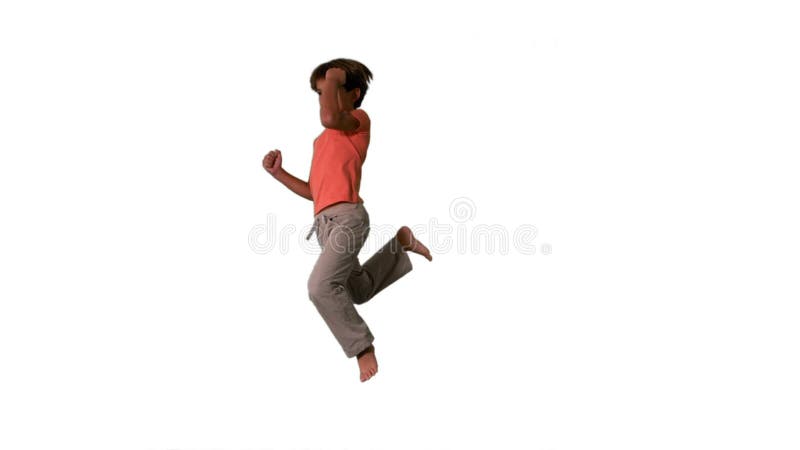 Side View of Boy Jumping Up and Down on White Background Stock Video ...
