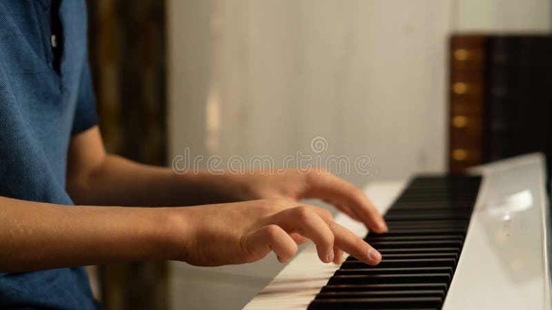 Side View of Boy S Hands Pressing Piano Keys on Keyboard Stock Photo ...