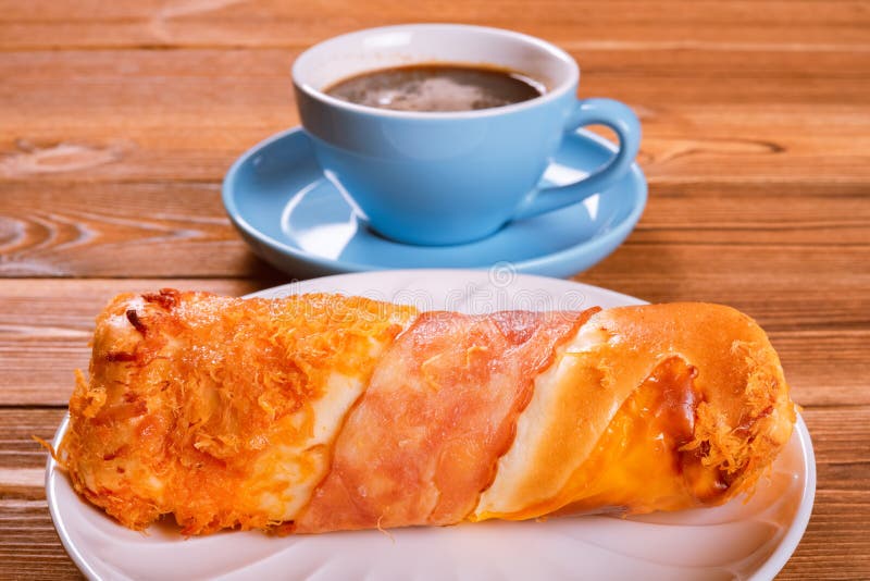 Bread with Bacon and Shredded Pork and Cup of Coffee on Back Horizontal ...