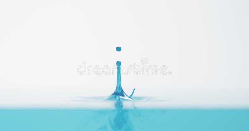Side View of Bright Blue Water Drop with Accurate Splash Stock Image ...