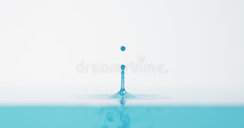Side View of Bright Blue Water Drop with Accurate Splash Stock Photo ...