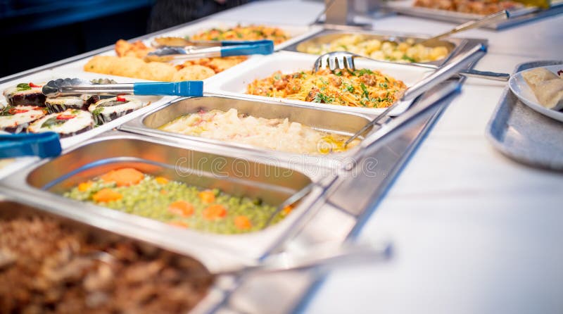 Top View on Buffet Wooden Board with Meat, Eggs, Vegetables, Bread Etc ...