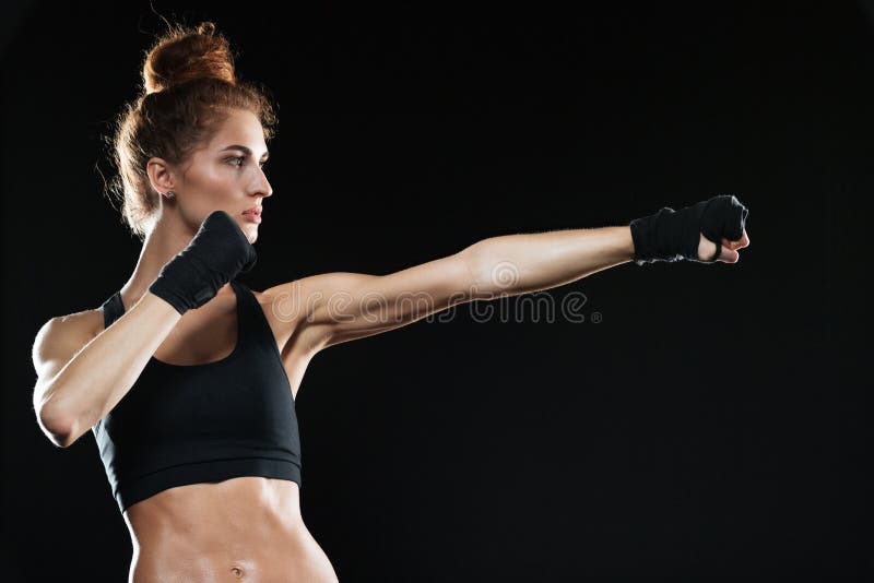 MMA Fighter Practicing Some Kicks with Punching Bag Stock Image - Image ...