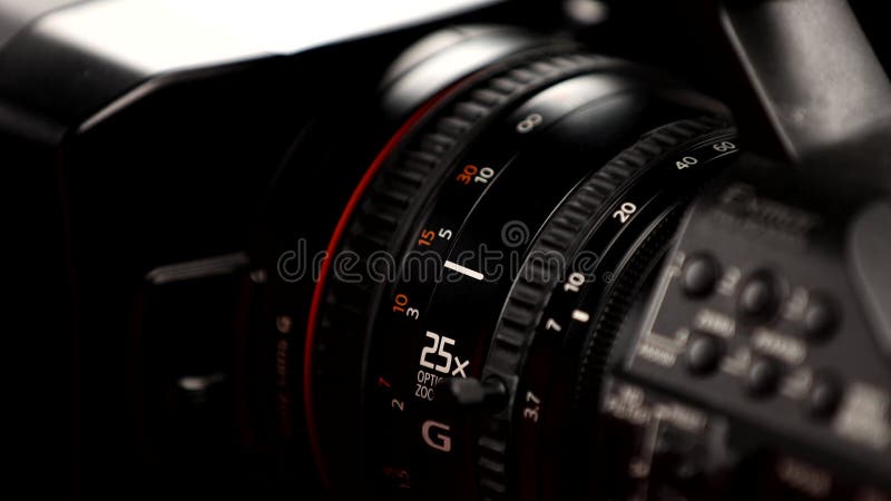 Side View of a Camera Lens Barrel with Engraved Focus and Zoom Settings ...
