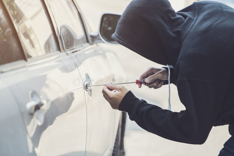 Side View of Car Thief in Action Stock Photo - Image of criminal ...