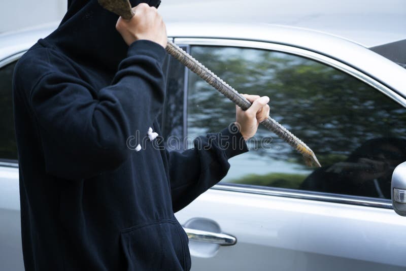 Side View of Car Thief in Action Stock Photo - Image of mask, robber ...