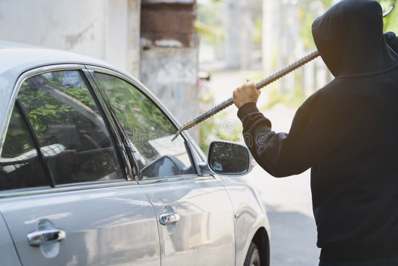 Side View of Car Thief in Action Stock Photo - Image of criminal ...