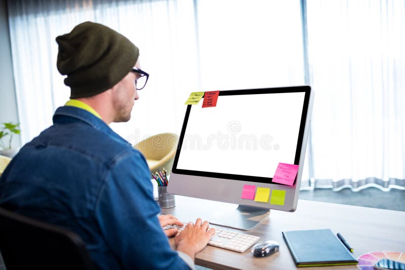 Side View of Casual Man Working at Computer Desk Stock Photo - Image of ...