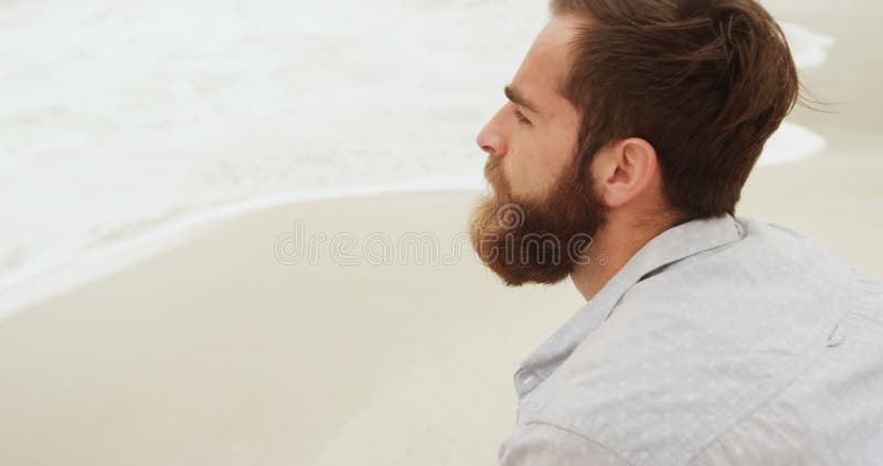 Side View of Caucasian Thoughtful Man Looking at Sea on the Beach 4k ...