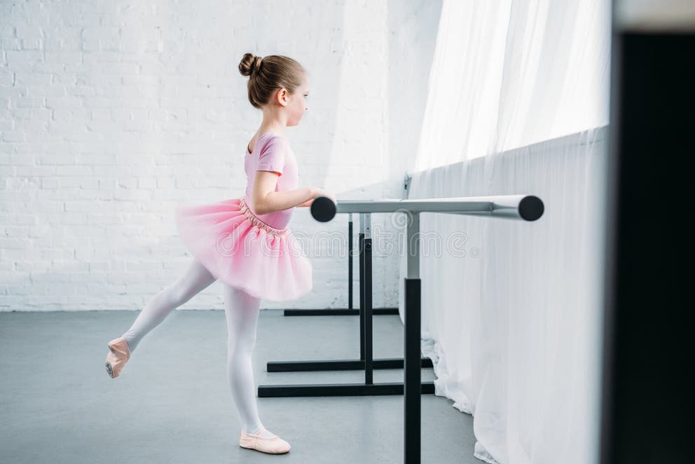 Side View of Child in Pink Tutu Practicing Ballet Stock Photo - Image ...
