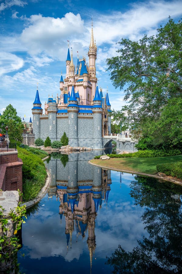 Side View of Cinderella Castle in Disney World with a Water Reflection ...