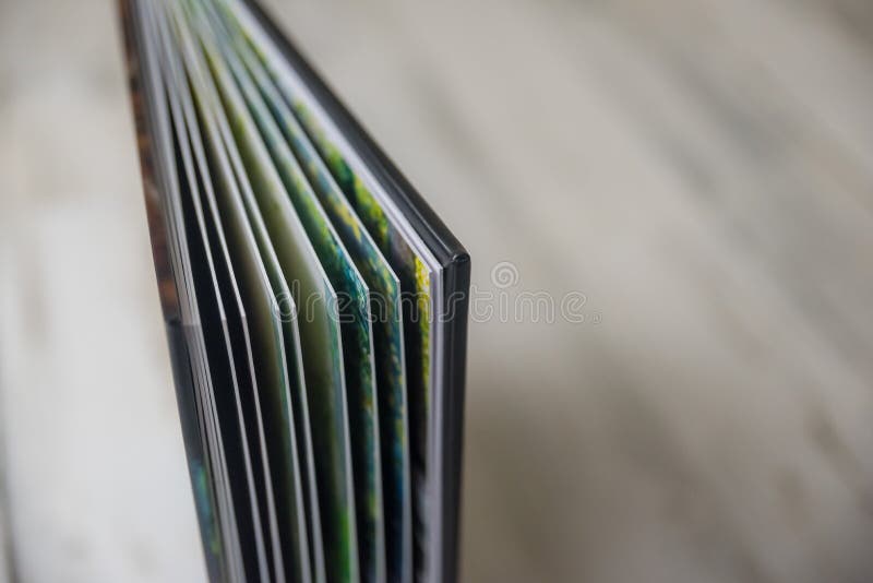 Side View Close Up of Thick and Rigid Wedding Album Pages in a Book ...