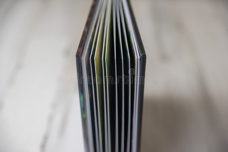 Side View Close Up of Thick and Rigid Wedding Album Pages in a Book ...