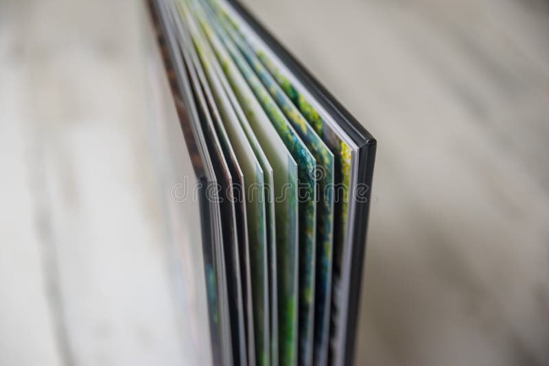 Side View Close Up of Thick and Rigid Wedding Album Pages in a Book ...