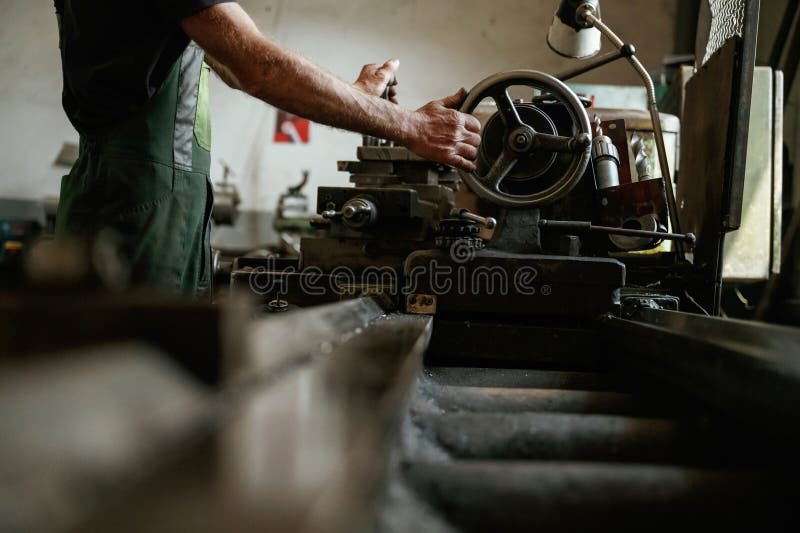 Side View. Close-up of Worker S Hands Operating Industrial Machinery in ...