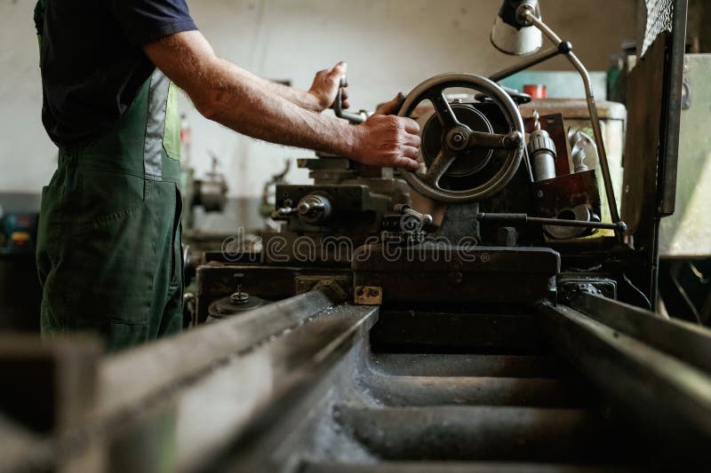 Side View. Close-up of Worker S Hands Operating Industrial Machinery in ...