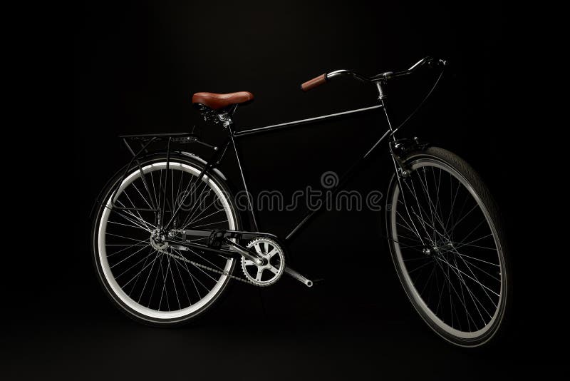 Side View of Comfortable Vintage Bicycle Isolated on Black Stock Photo ...