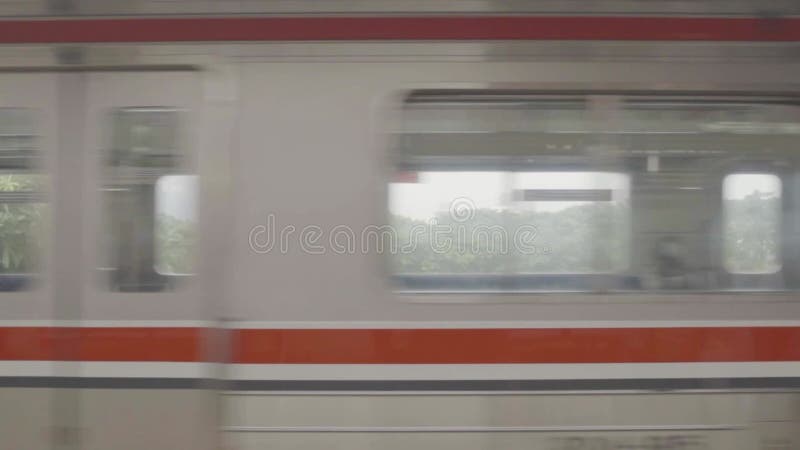 Side View of a Commuter Train Passing by at High Speed. Moving Forward ...