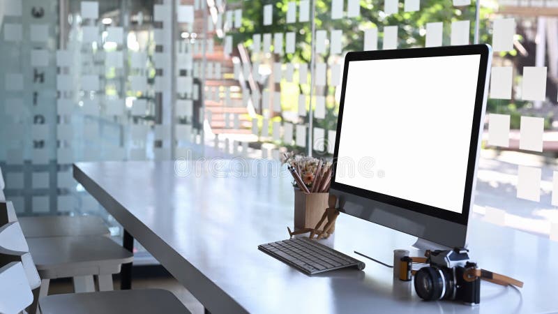 Side View of Computer with White Screen at Workspace. Stock Image ...