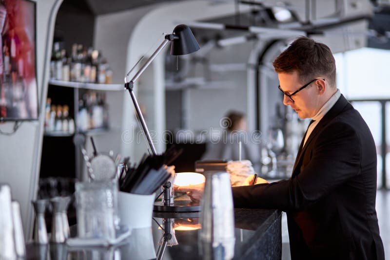Side View on Concentrated Focused Man Taking Notes while Standing in ...