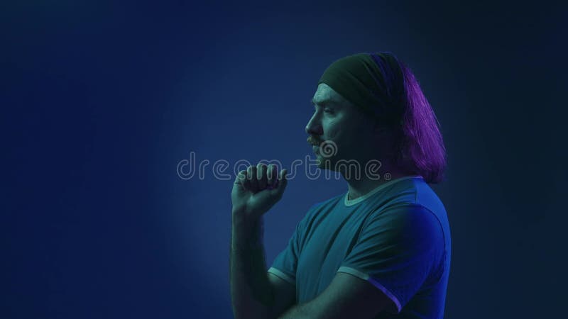 Side View of a Concentrated Man Working on an Invisible Screen. Profile ...