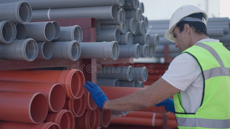 Side View of Concentrated Professional Middle Eastern Man Inspecting ...