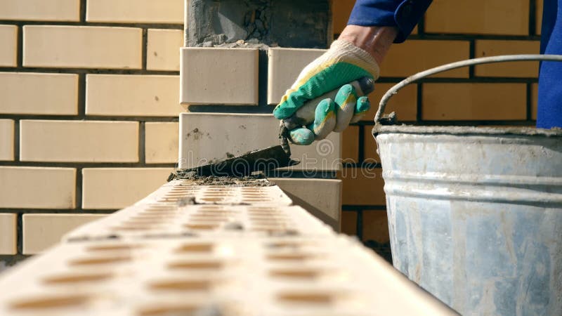Side View of Concrete Getting Spread on the Bricks Stock Video - Video ...