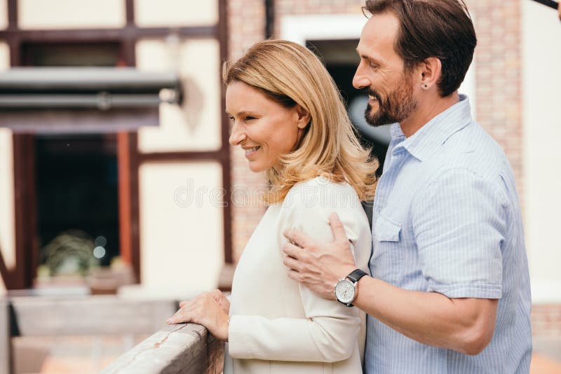 Side View of Couple Hugging Stock Image - Image of street, people ...