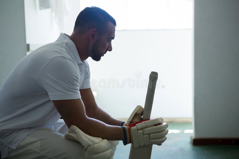 Side View of Cricket Player Sitting on Bench Stock Photo - Image of ...