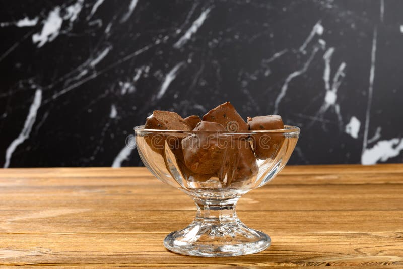 Cup of Fresh Chocolate Ice Cream Blocks on a Wood Table Stock Image ...