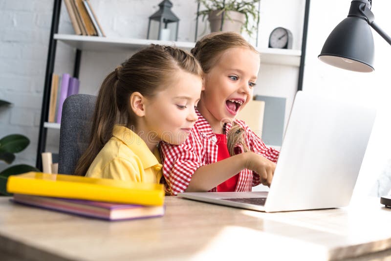 Side View of Cute Little Kids Using Laptop at Table Stock Image - Image ...