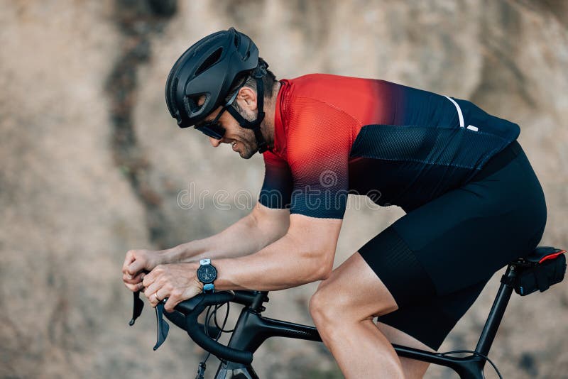 Side View of a Cyclist Putting Effort during Training Outdoors.Male ...