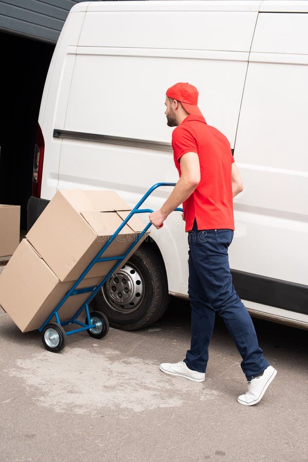 Side view of delivery man stock image. Image of professionaloccupation ...