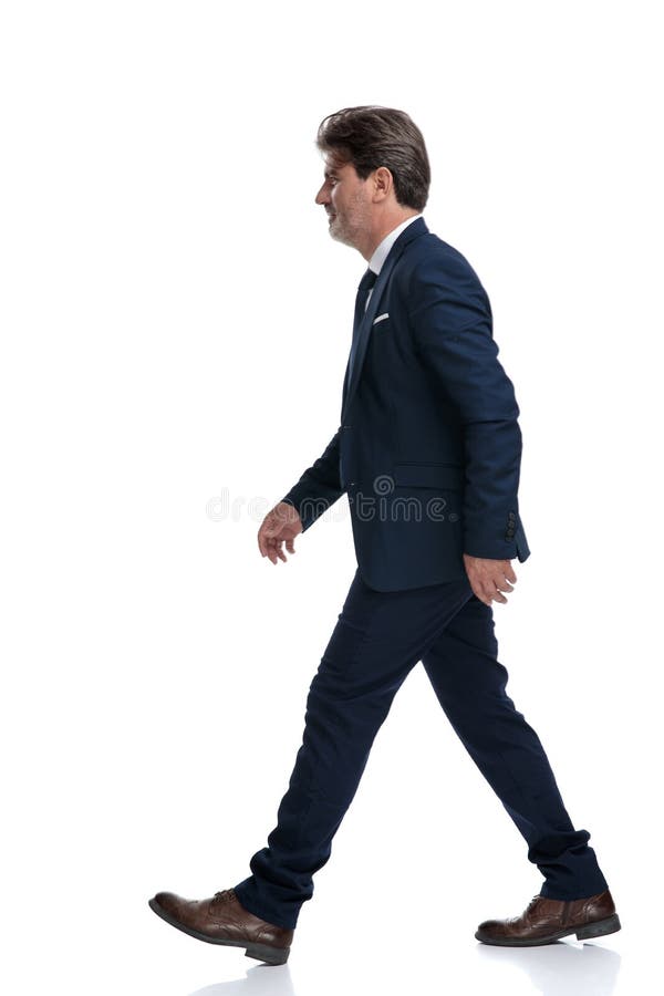 Determined Man Stepping Forward and Looking To the Camera Stock Photo ...
