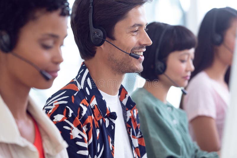 Customer Service Executives Working on Computer at Desk Stock Image ...