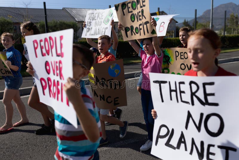 Group of Elementary School Pupils Walking on a Protest March Stock ...